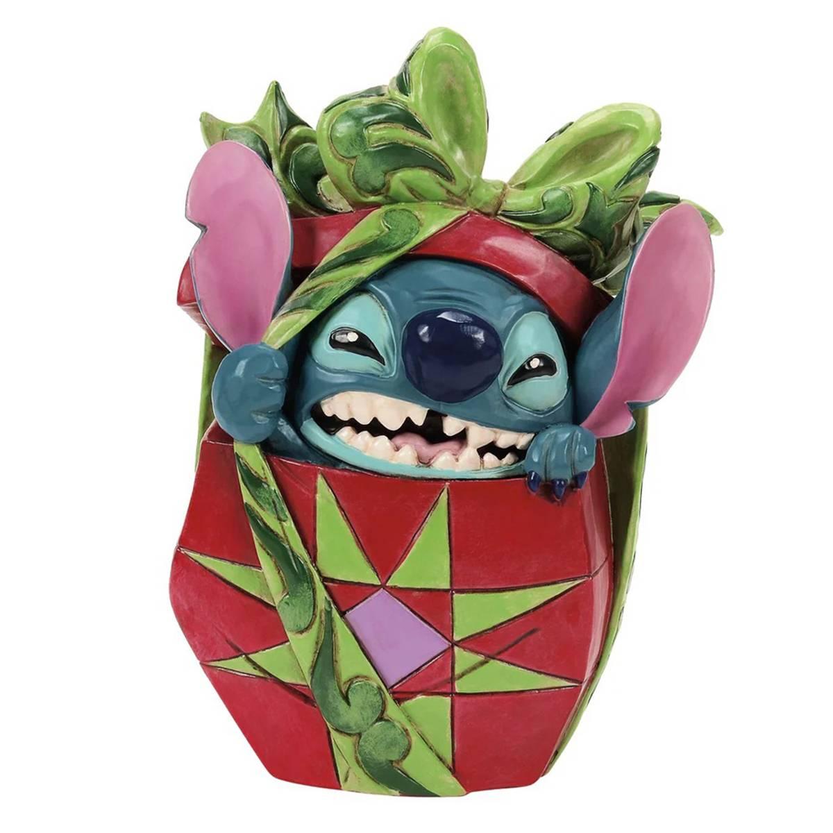 Click here for Jim Shore Stitch Tearing Christmas Present Figurin... prices