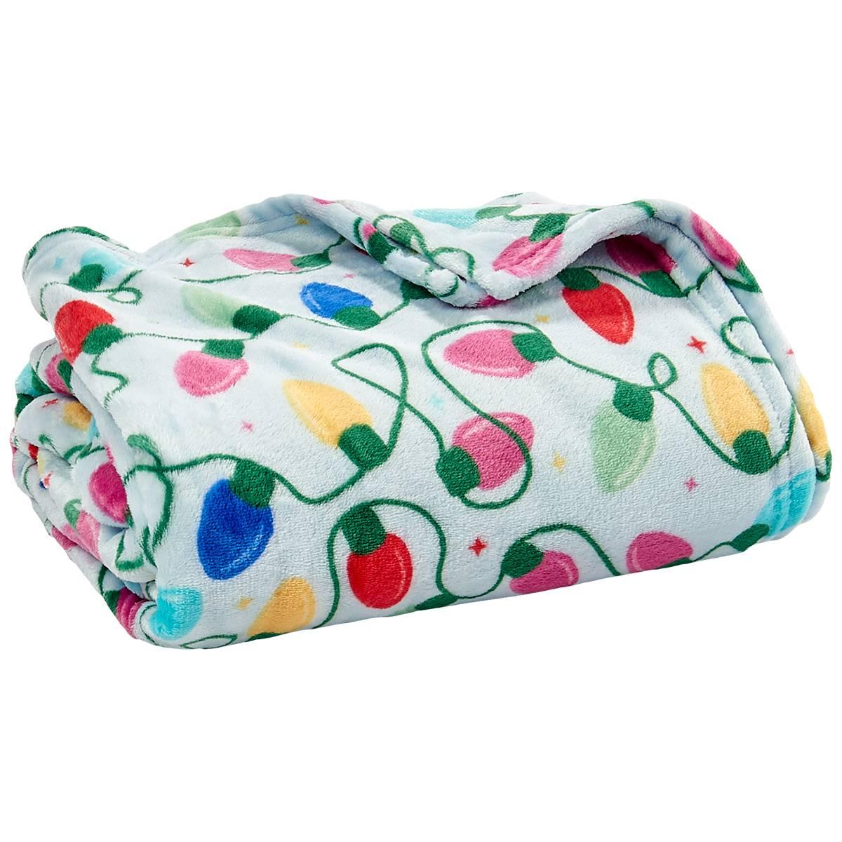 Click here for Ashley Cooper(tm) Twinkling Lights Plush Throw prices