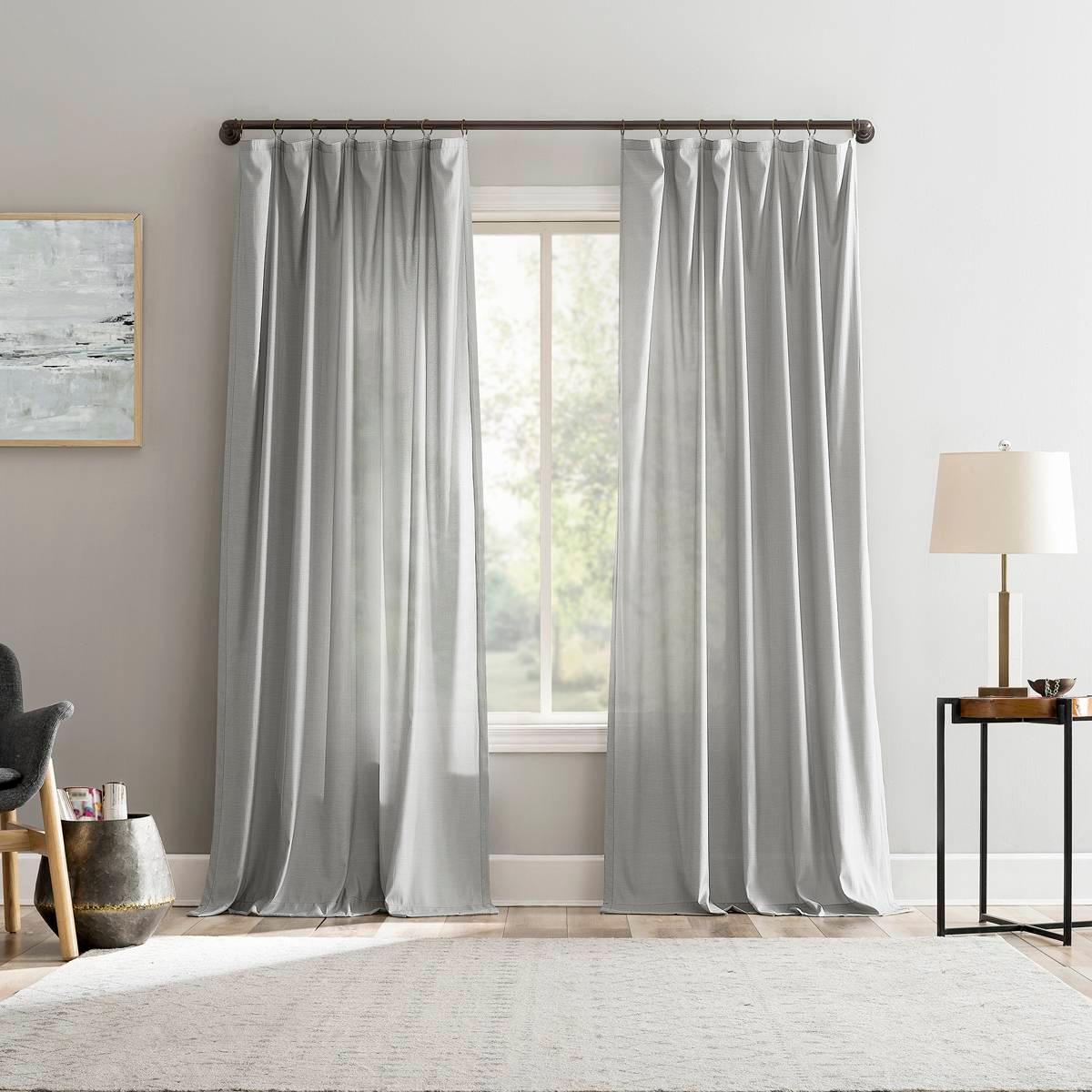 Click here for Lathan Sheer Tab Top Circle Panel Curtain prices