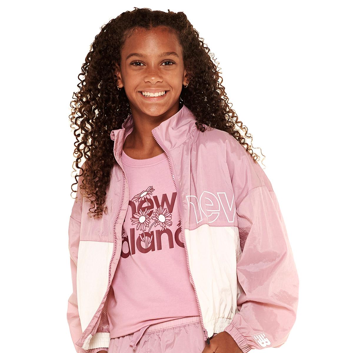 Click here for Girls (7-16) New Balance Short Sleeve Oversized Fl... prices