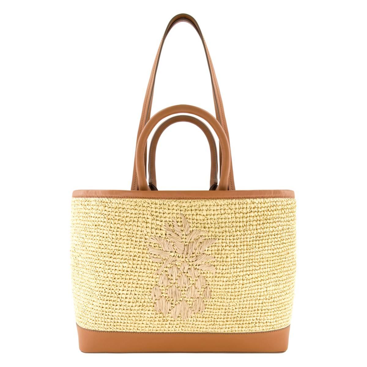 Click here for Tommy Bahama Leather Trim Raffia Tote with Pouch prices