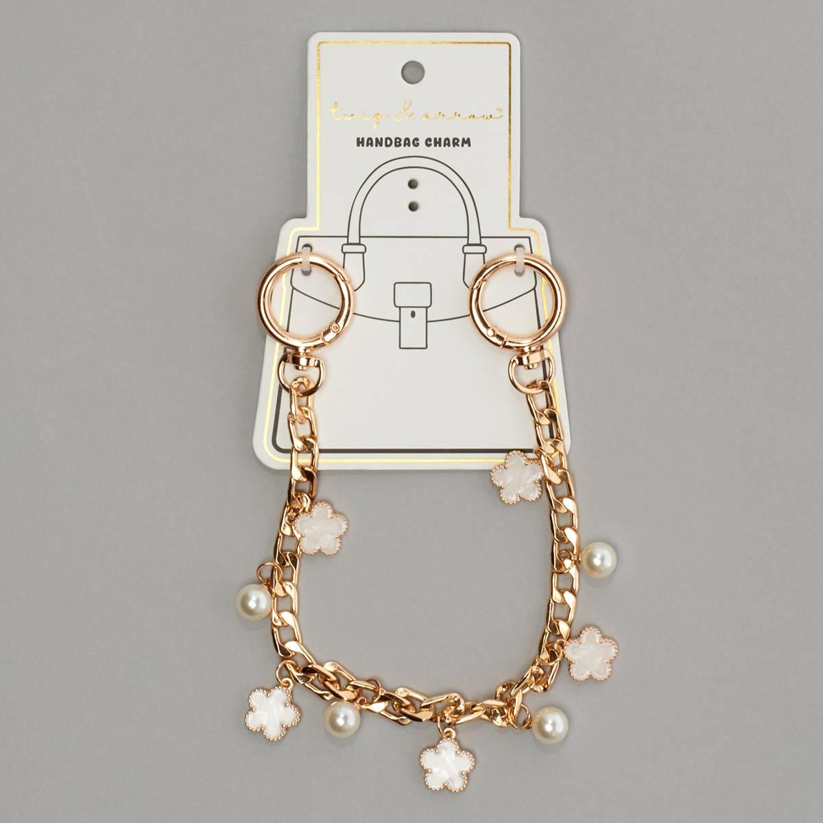 Click here for Womens Twig & Arrow Shiny Gold Bag Charm with Pear... prices