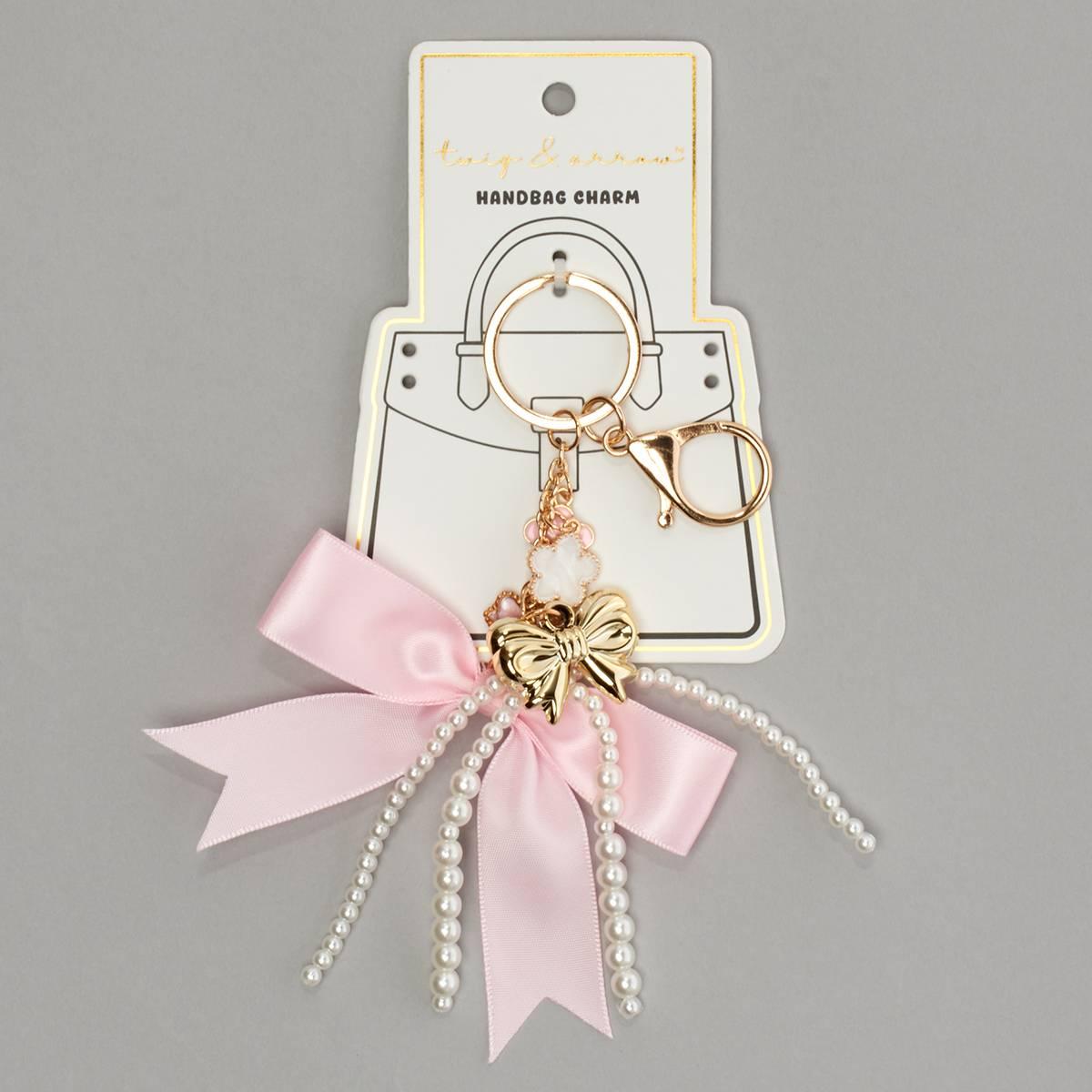 Click here for Womens Twig & Arrow Bow with Faux Pearls Bag Charm prices