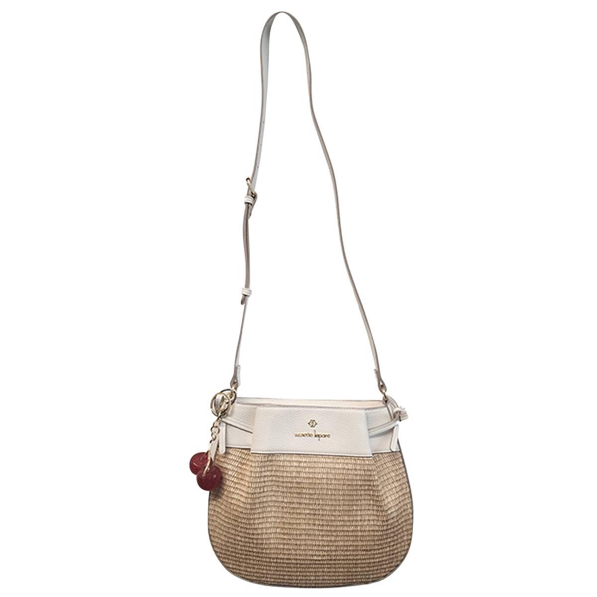 Click here for Nanette Lepore Pennie Straw Crossbody with Charm prices