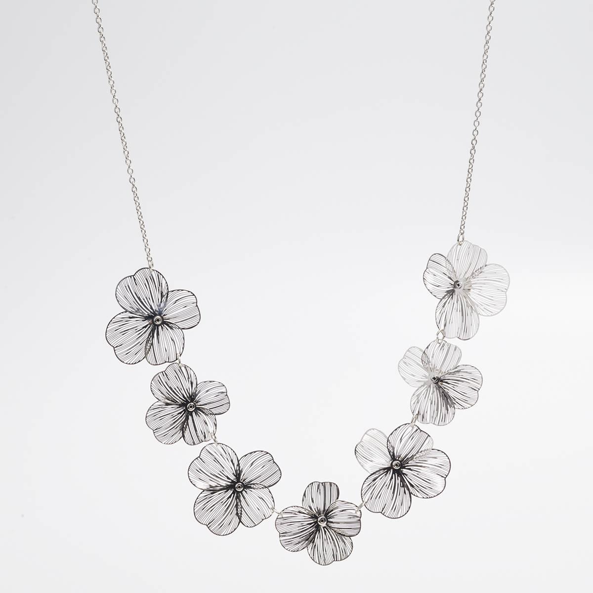Click here for Ashley Cooper(tm) Floral Layered Openwork Petals S... prices