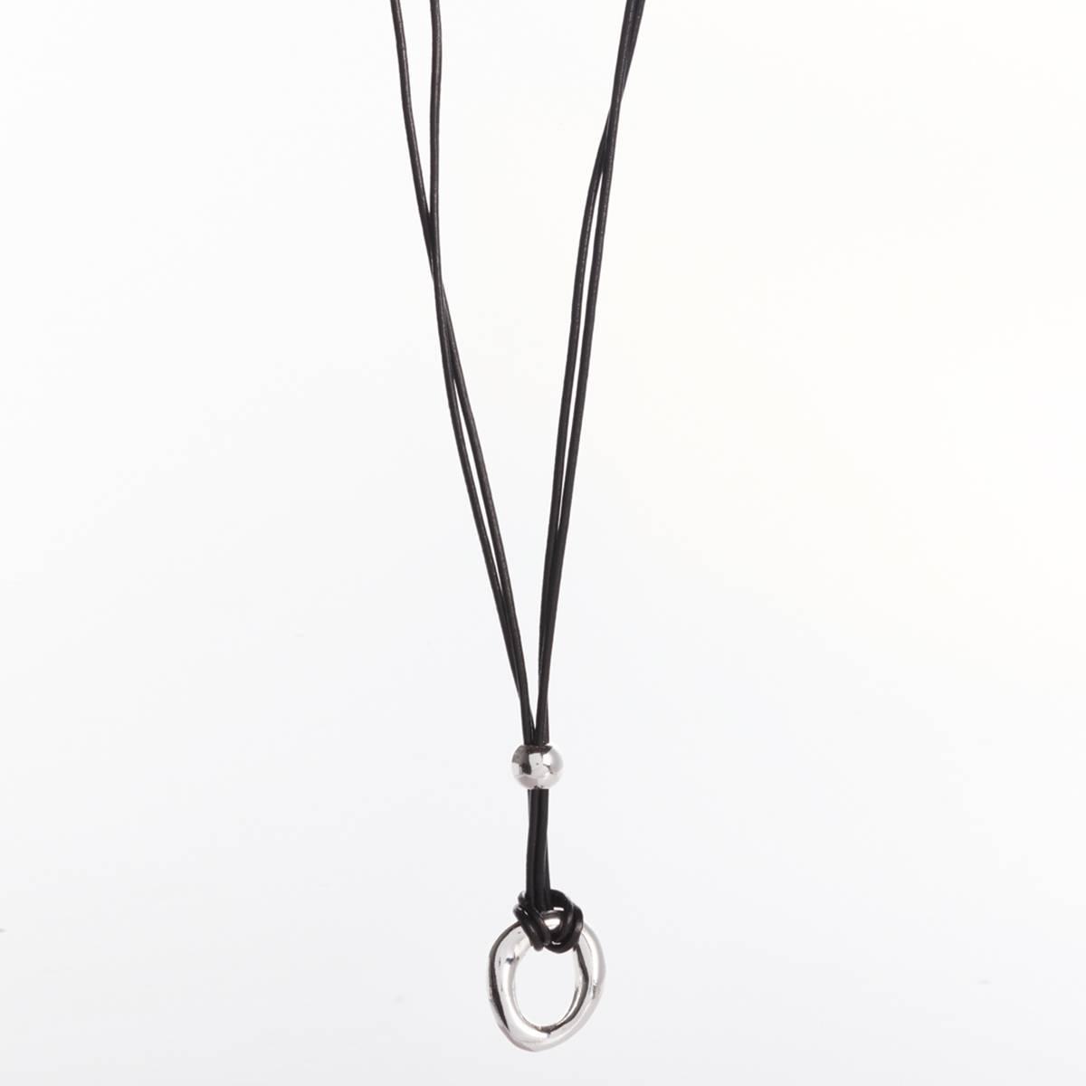 Click here for Design Collection Silver-Tone Oval Corded Pendant... prices