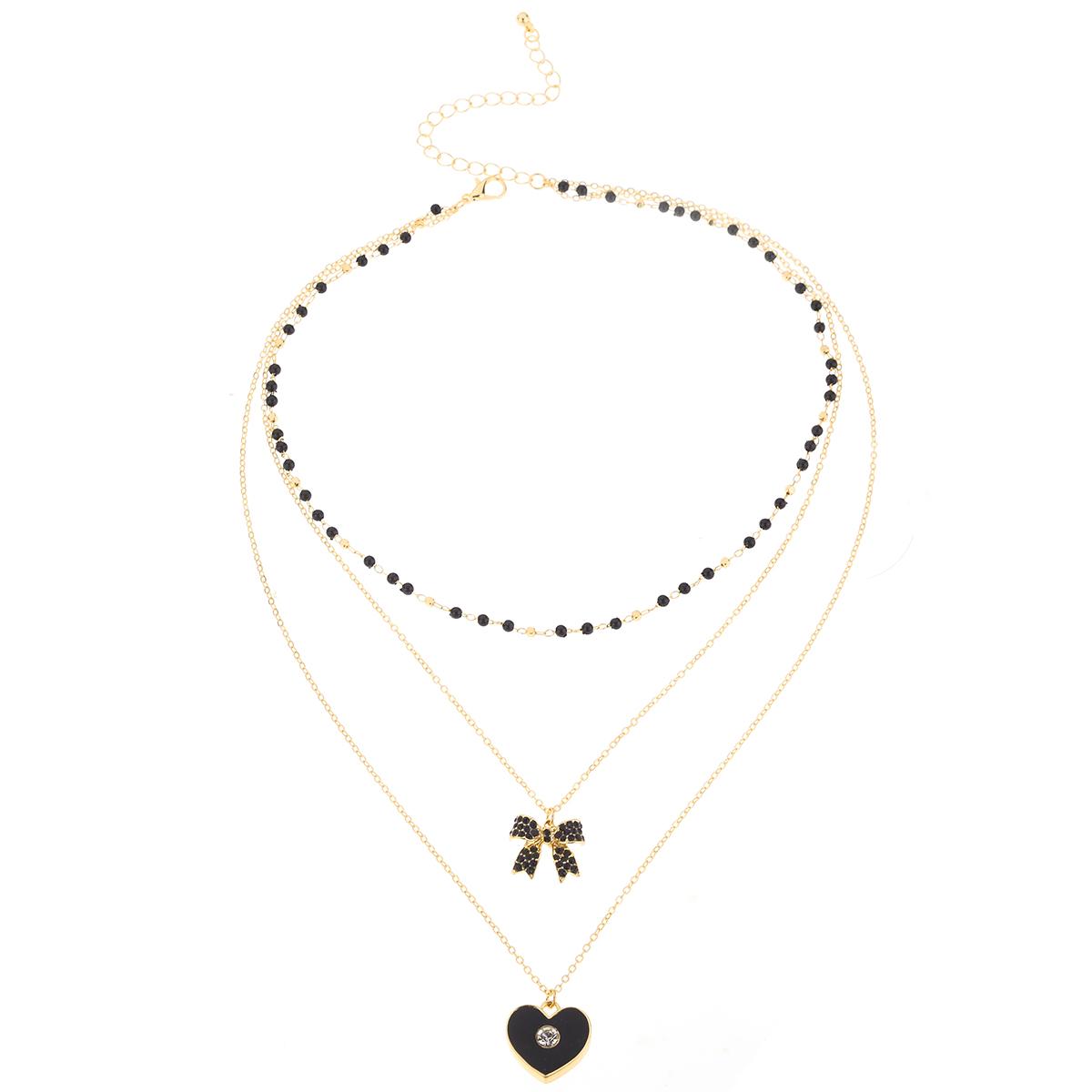 Click here for Ashley Gold-Tone & Black Layered Pendant Necklace prices