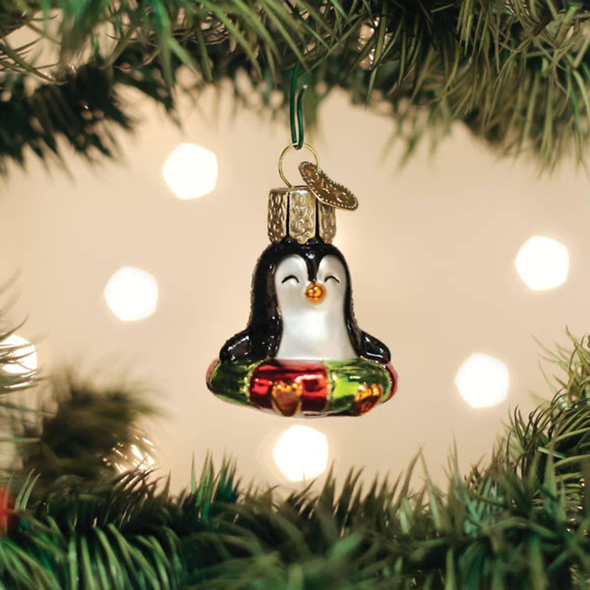 Click here for Old World Christmas Mini Penguin Blown Glass Ornam... prices