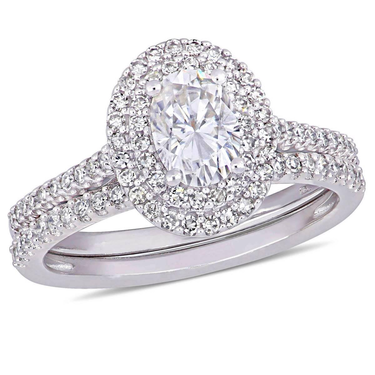 Click here for Diamond Classics(tm) 14kt. Round Cut Halo Bridal R... prices