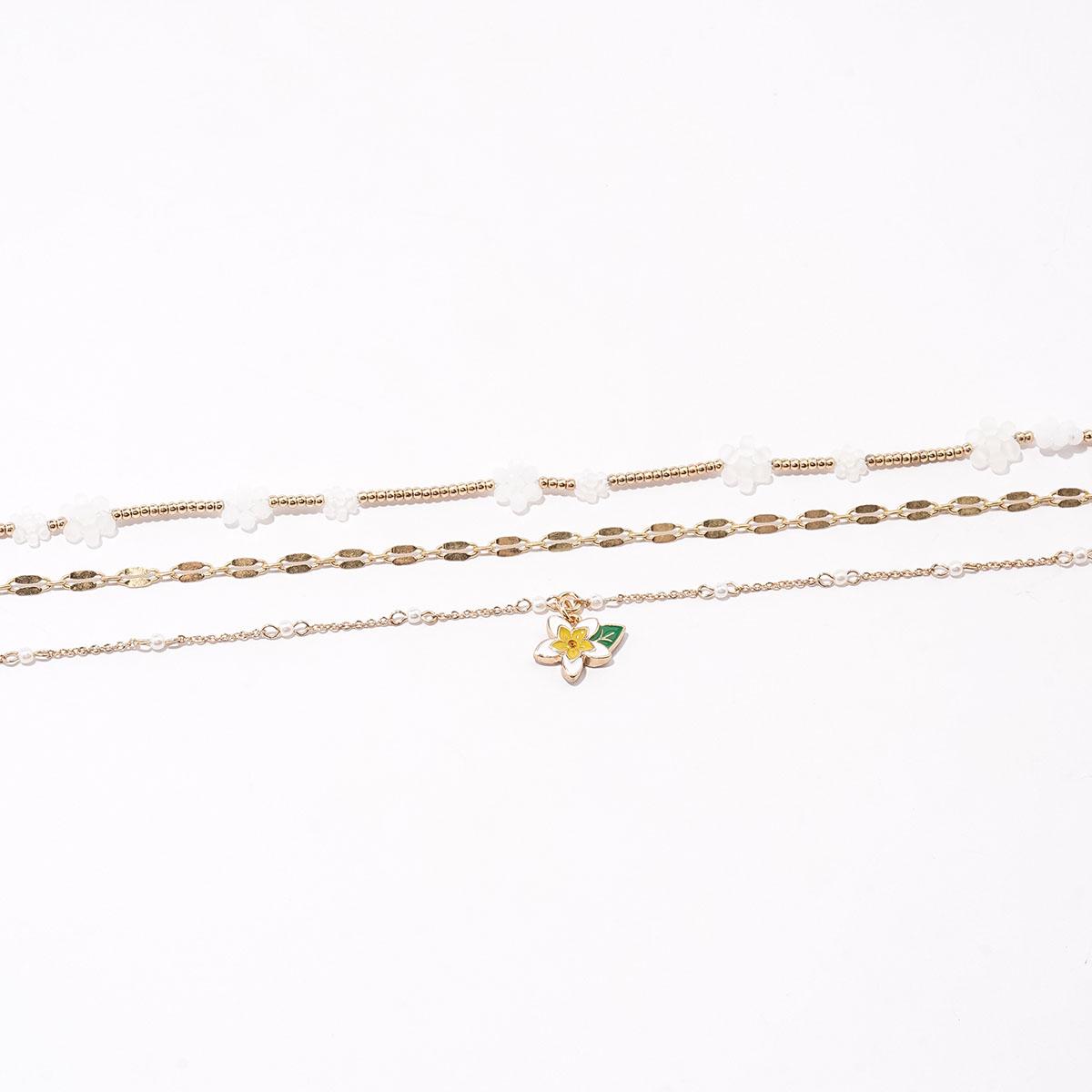 Click here for Ashley 3pc. Shiny Gold-Tone Floral Anklet Set with... prices