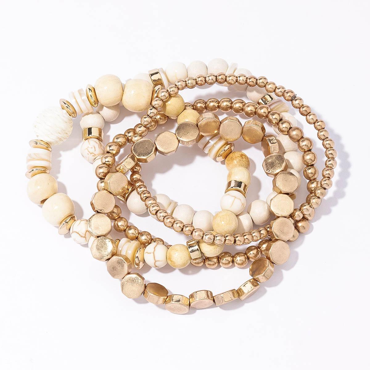 Click here for Ashley Cooper(tm) 5pc. Gold Tone & Cream Beaded Br... prices