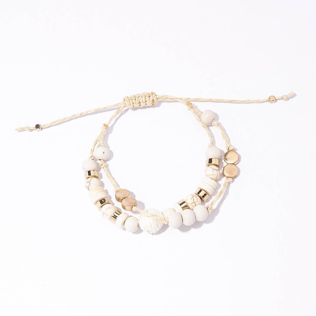Click here for Ashley Cooper(tm) Cream and Gold Tone Adjustable B... prices