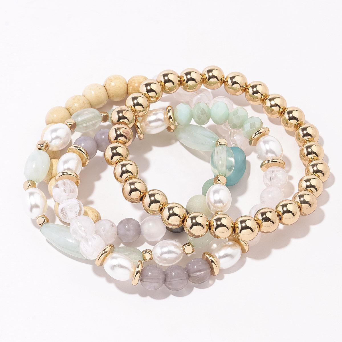 Click here for Ashley Cooper(tm) 4pk. Gold-Tone/Pastel/Wood Bead... prices