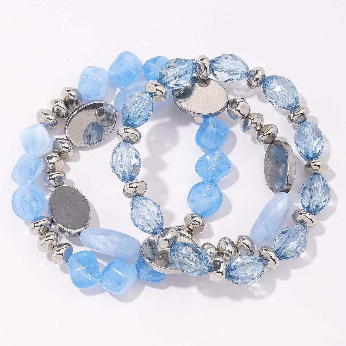 Click here for Ashley Cooper(tm) 3pc. Chunky Blue Tone Stretch Br... prices