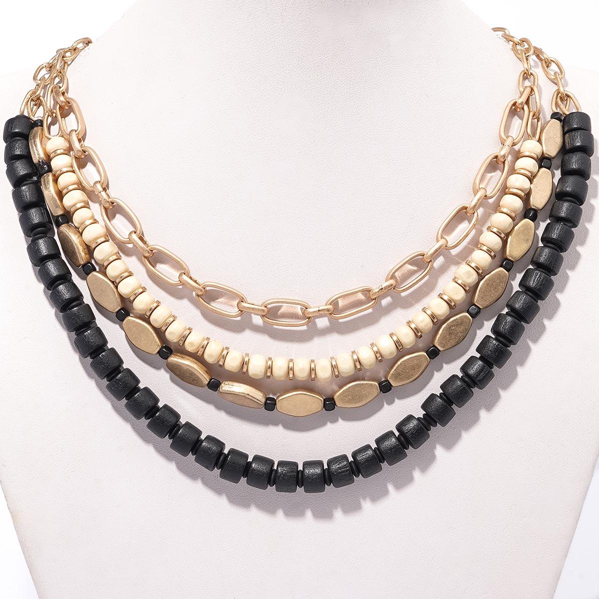 Click here for Ashley Cooper(tm) 4-Row Neutral & Black Beaded Nec... prices