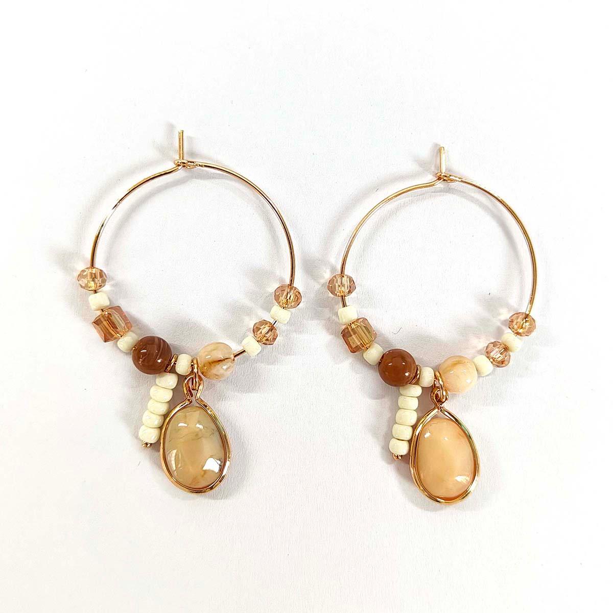 Click here for Ashley Cooper(tm) Gold-Tone Neutral Drop Beaded Ho... prices