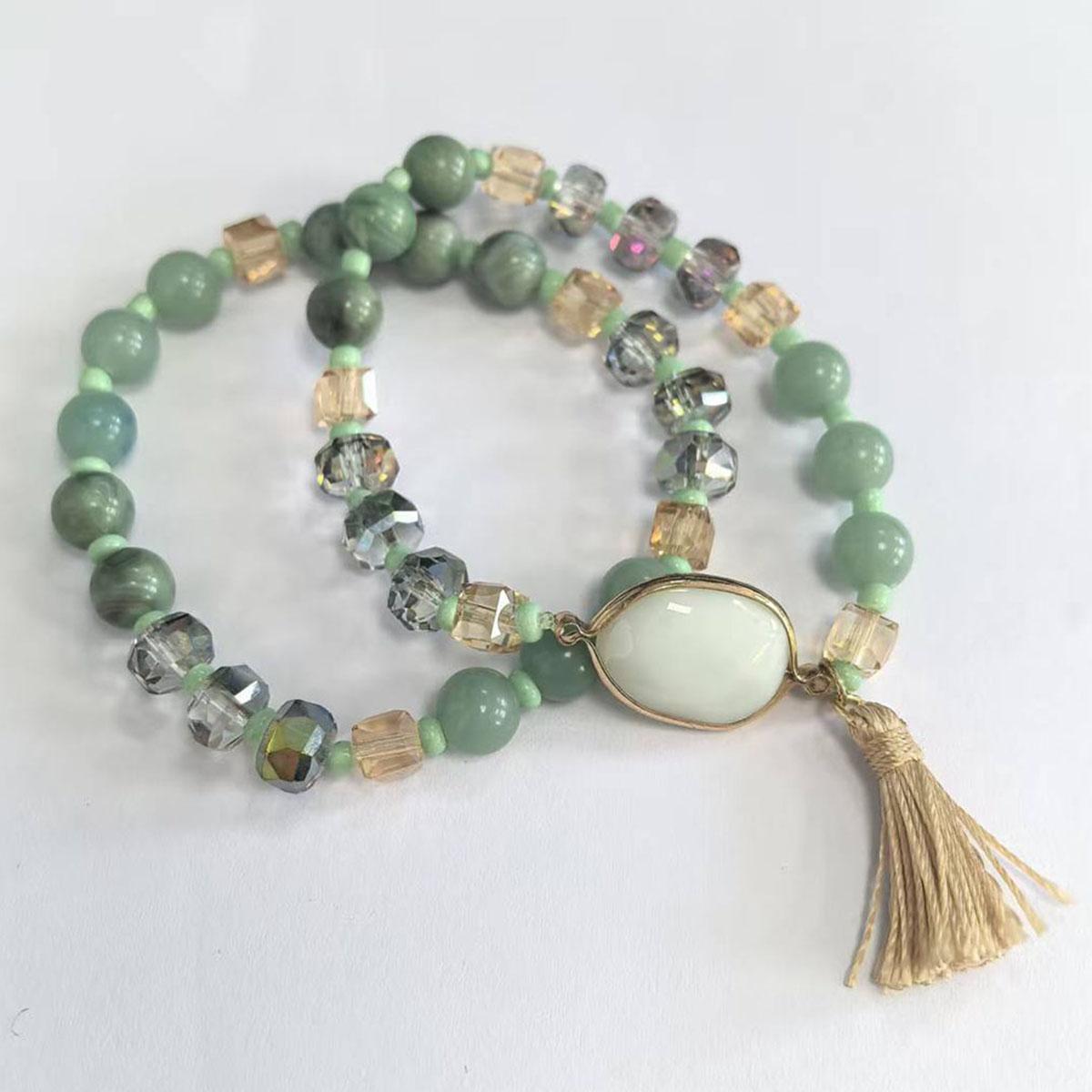 Click here for Ashley Cooper(tm) Gold-Tone Tonal Green Bead Tasse... prices