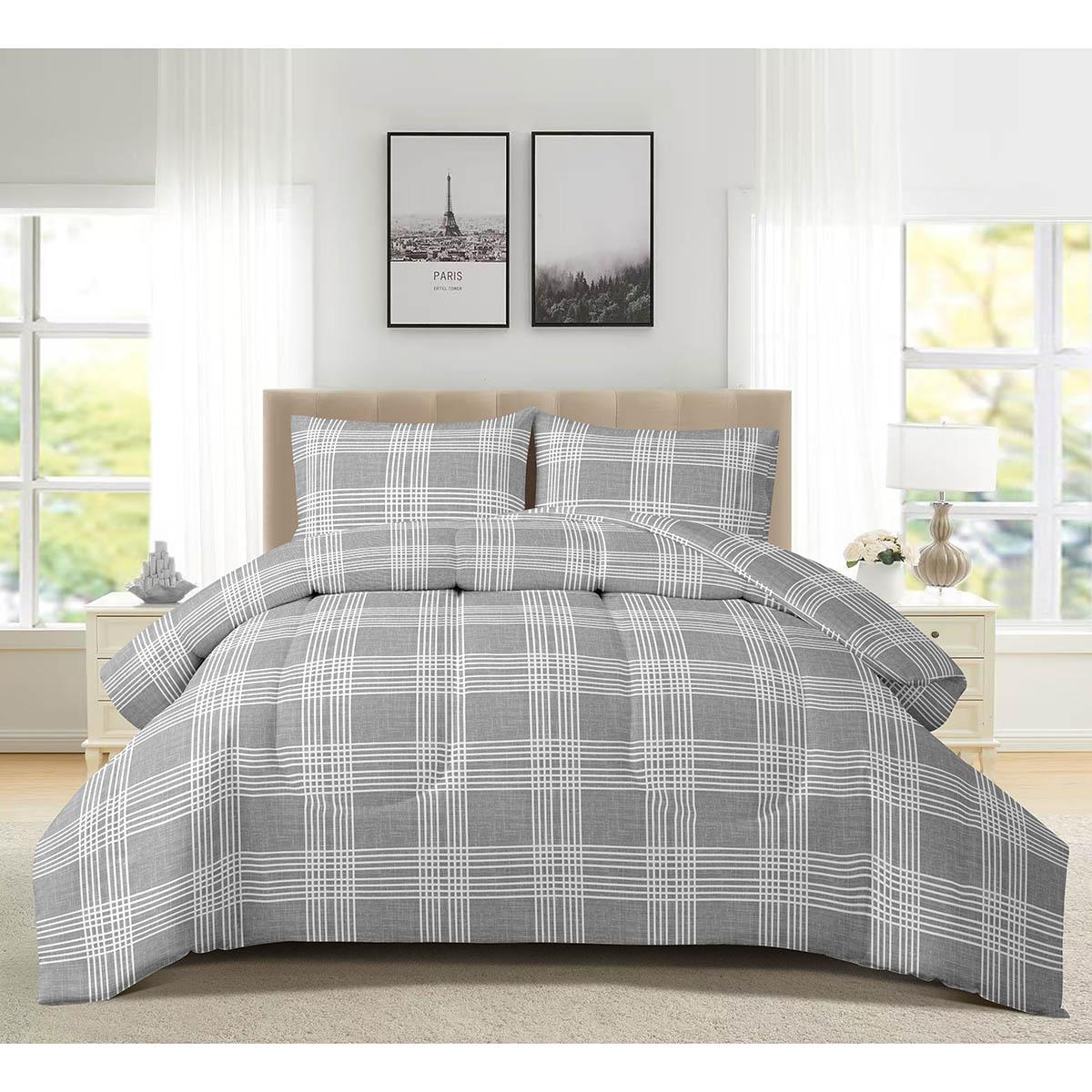 Click here for Ashley Cooper(tm) Ford Plaid Reversible Comforter prices