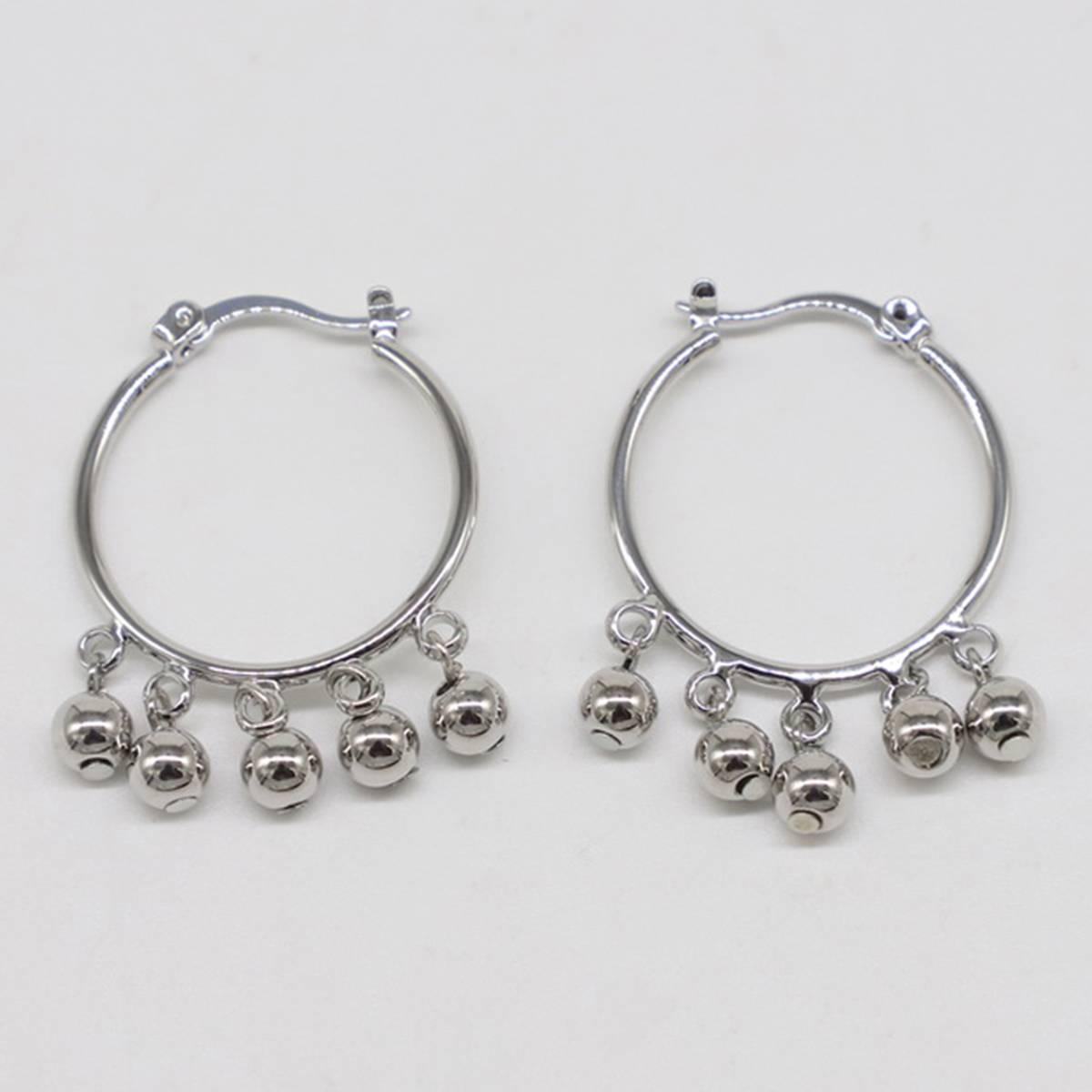 Click here for Design Collection Silver-Tone Ball Hoop Earrings prices