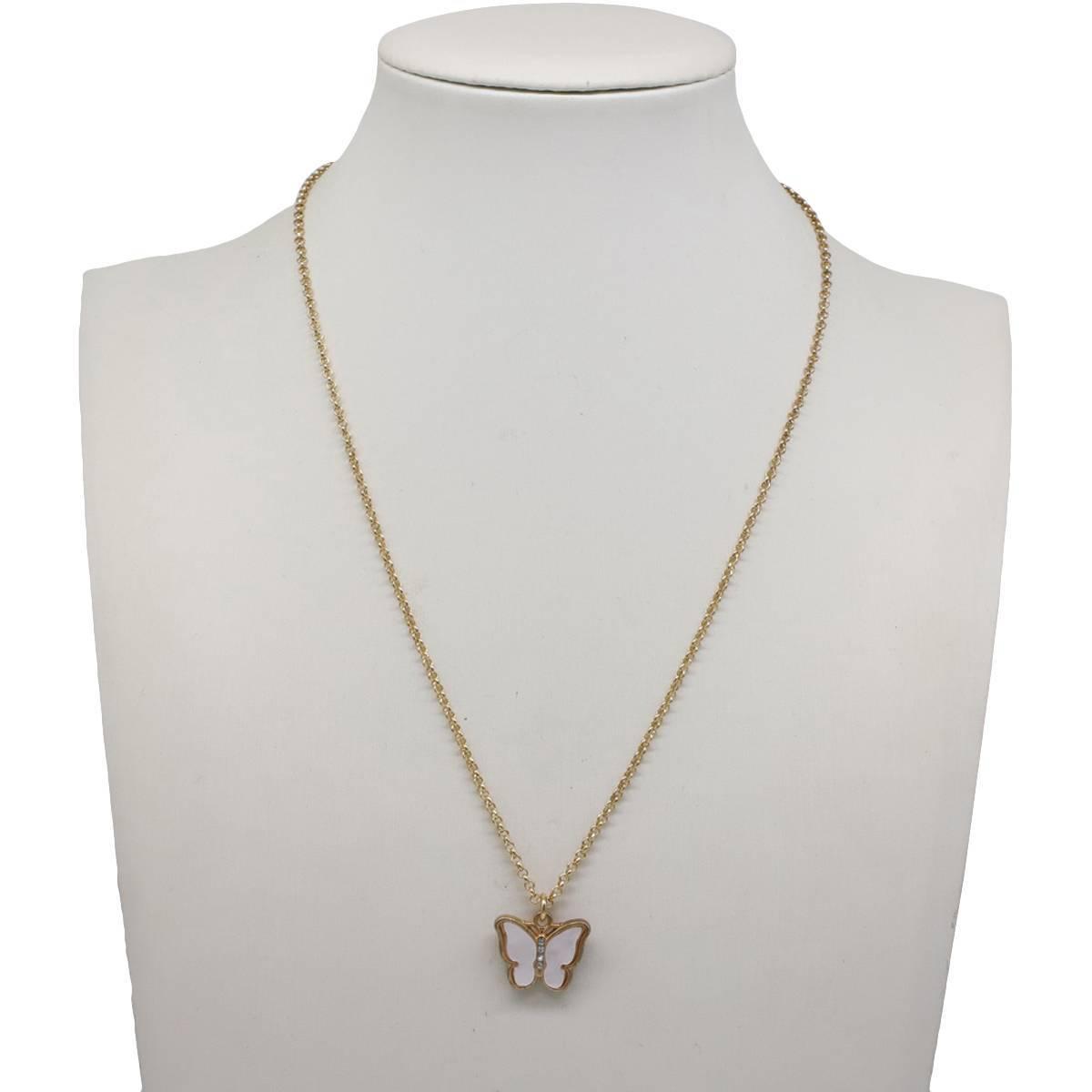 Click here for Ashley Gold-Tone Mother of Pearl & Crystal Butterf... prices