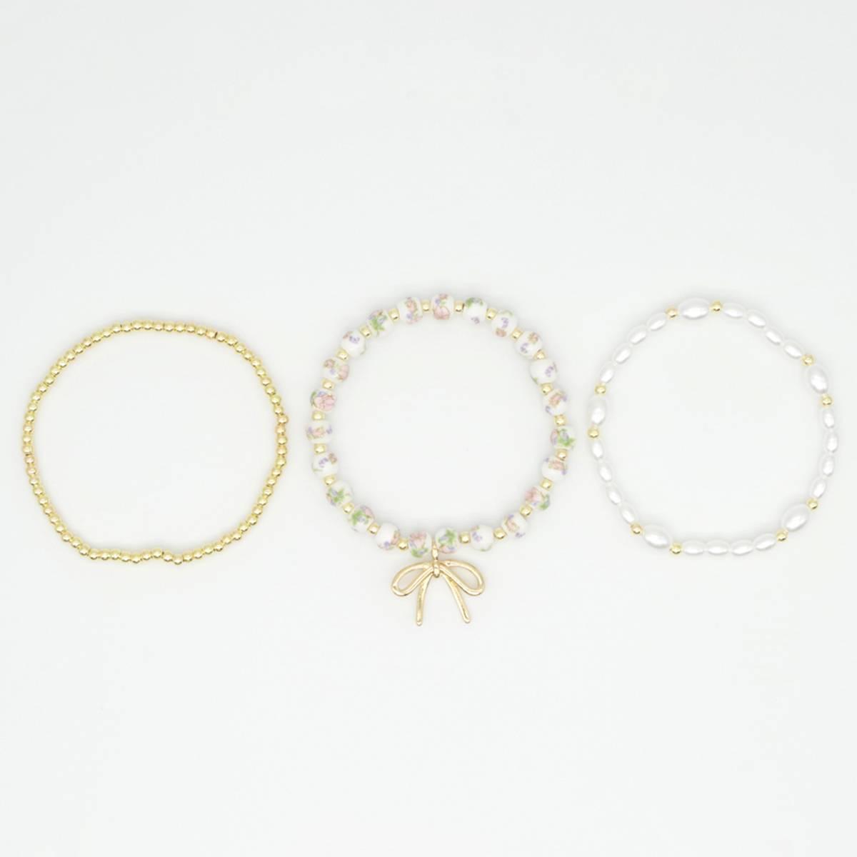 Click here for Ashley 3-Row Gold & Pearl Stretch Bracelet Set prices