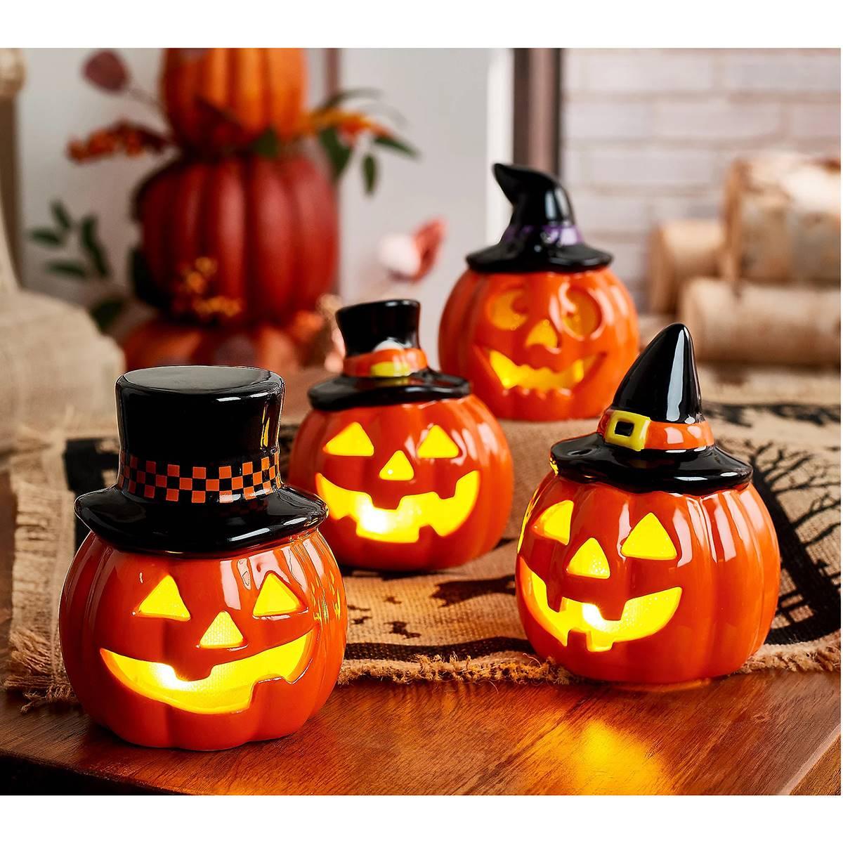 Click here for Set of 4 Mr. Halloween Jack O Lantern Figures prices