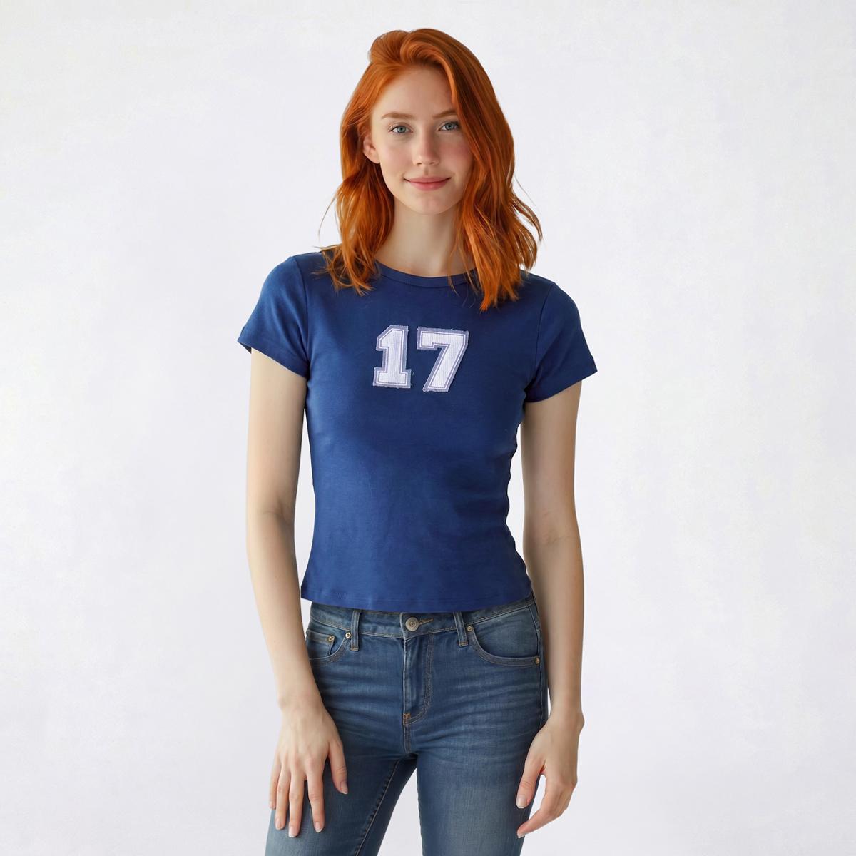 Click here for Juniors No Comment Denim Applique Baby Tee - Denim prices