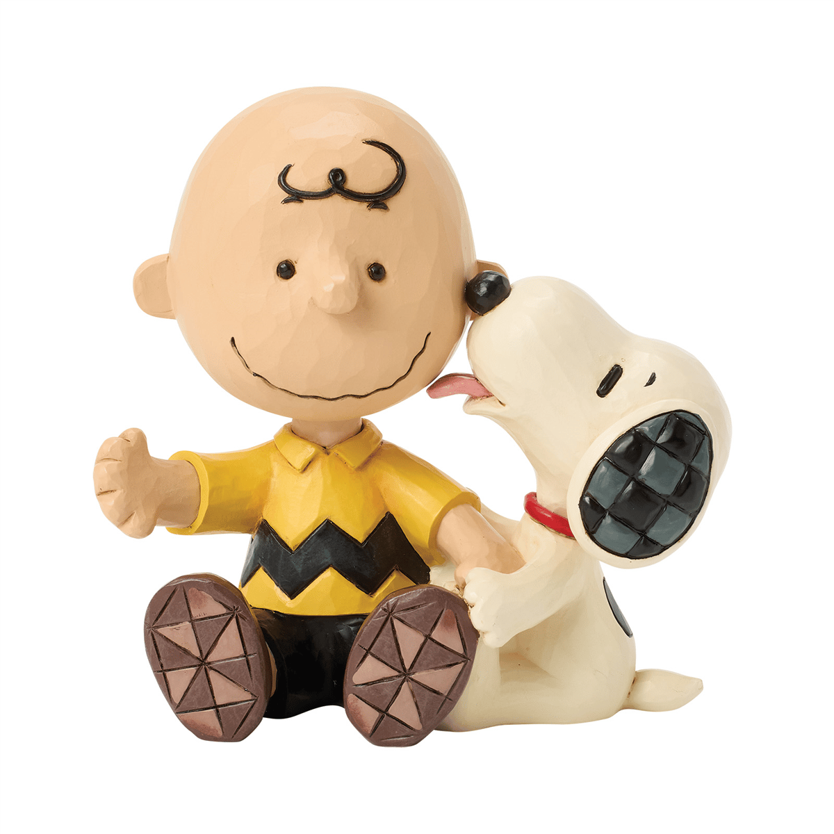 Click here for Jim Shore Peanuts Charlie Brown with Snoopy Figuri... prices