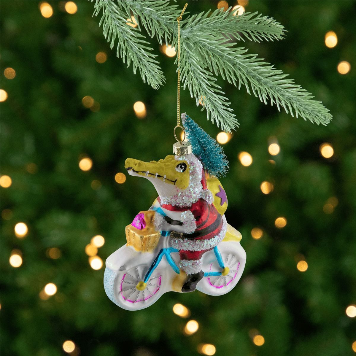 Click here for Northlight Crocodile Santa Glass Christmas Ornamen... prices