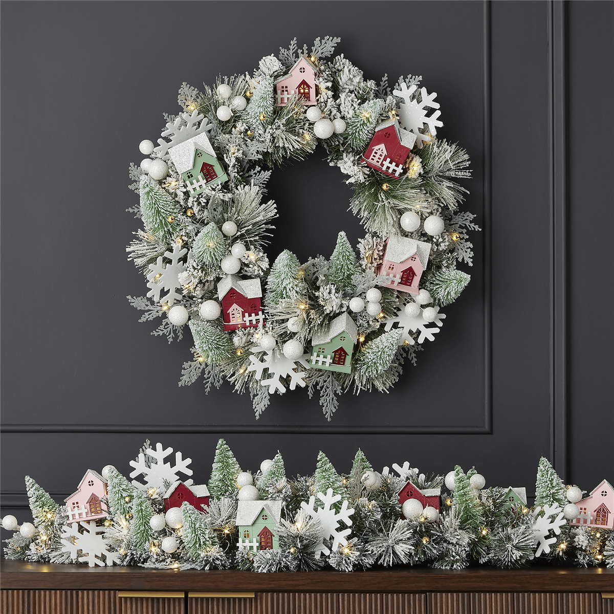 Click here for Seasonal LLC LED Snowy Cottage 60in. Garland prices